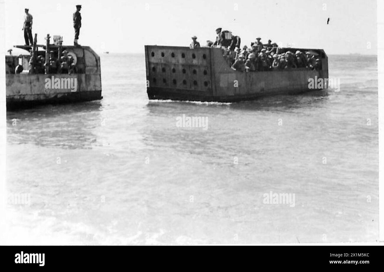 A Motor Landing Craft (M.L.C.) loaded with Bren carriers and troops ...