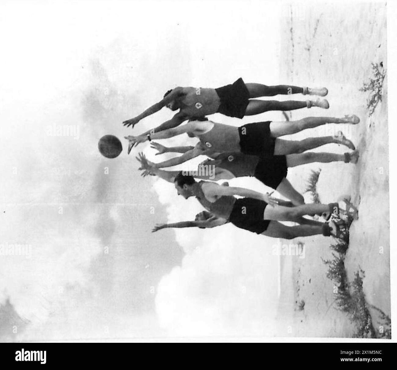 Members of a Free French Forces unit participate in sport, including a ...