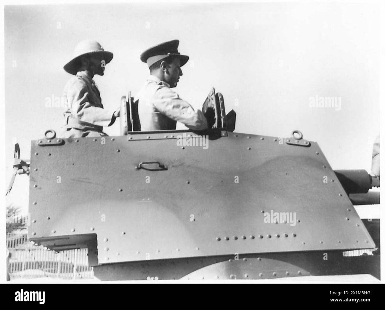 The Emperor of Abyssinia and the Crown Prince ride a tank while ...