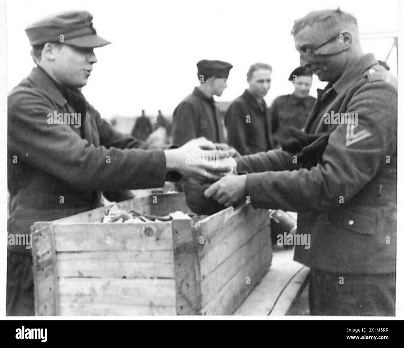 THE BRITISH ARMY IN NORTH-WEST EUROPE 1944-1946 - He draws his rations ...