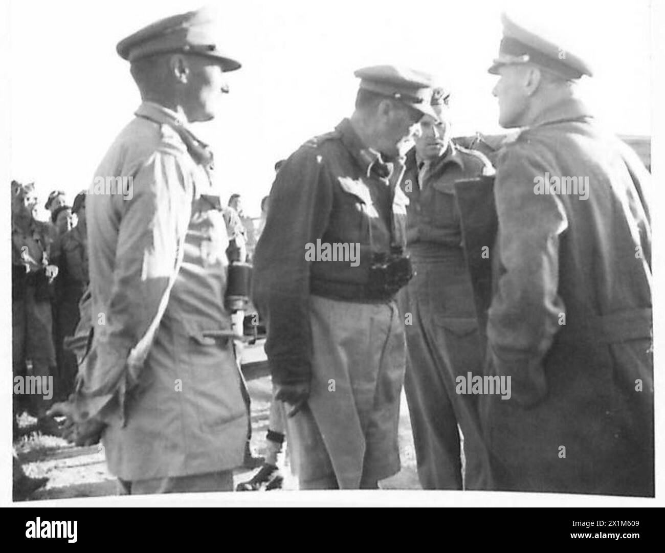 Commander of the German 90th Light Division surrenders, with Generals ...
