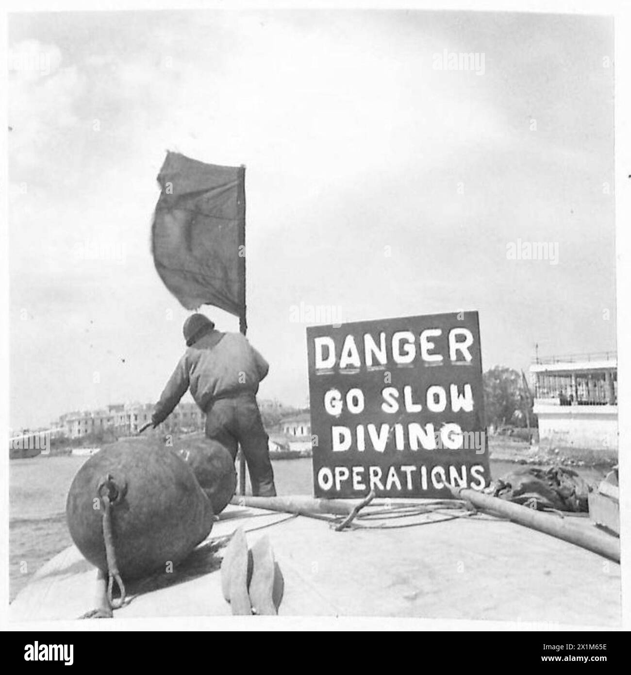 In Bizerta, a salvage boat approaches operations in North African ports ...