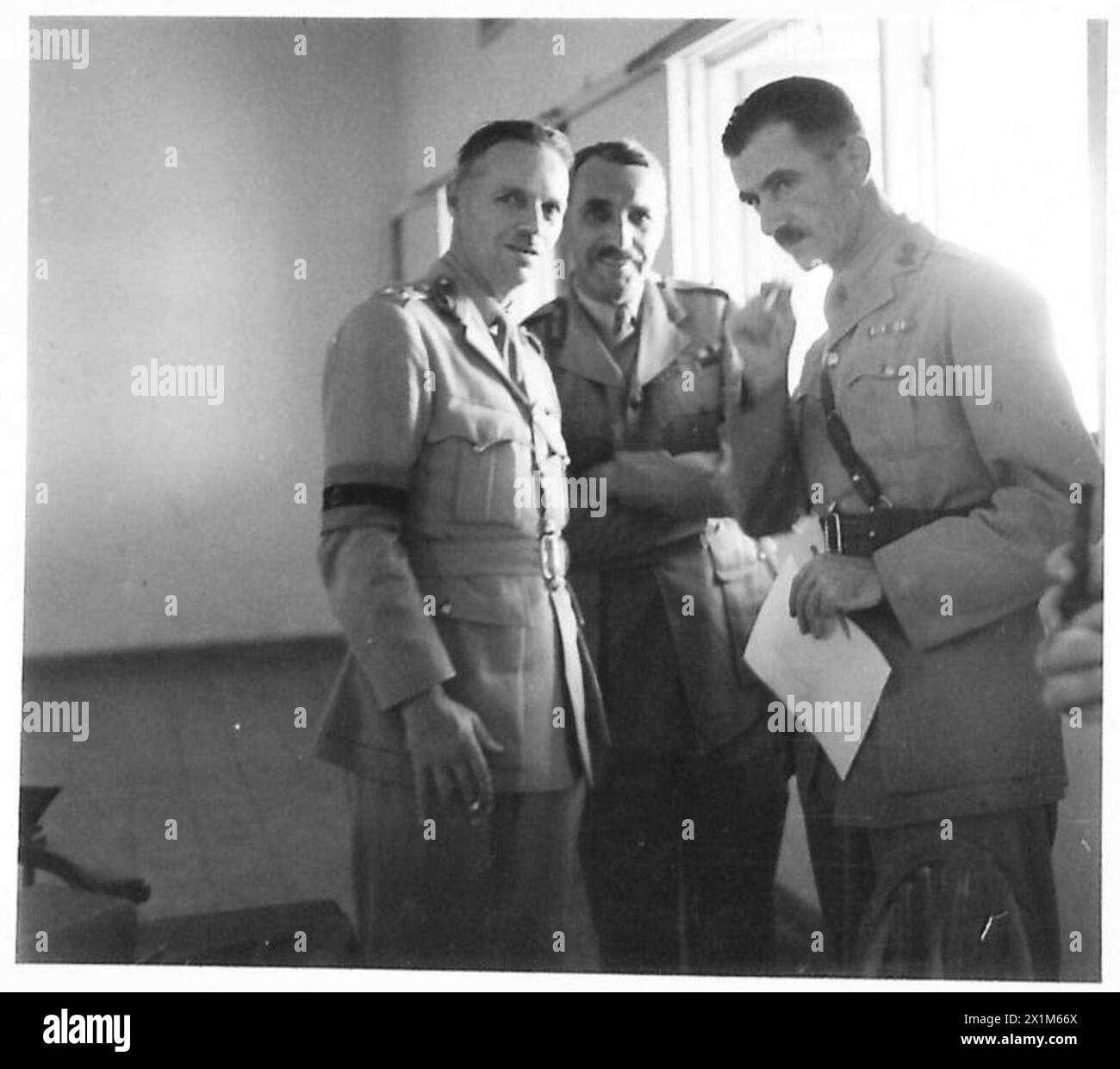 Vichy representatives sign the British Peace Convention while senior ...