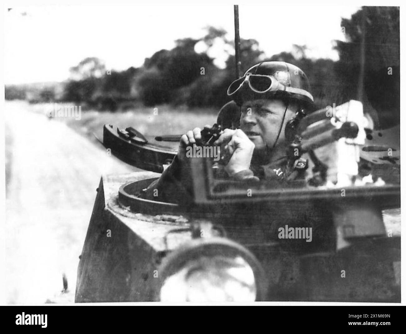 FAST SCOUT TANKS EXERCISING - The troop Commander keeping a watchful ...