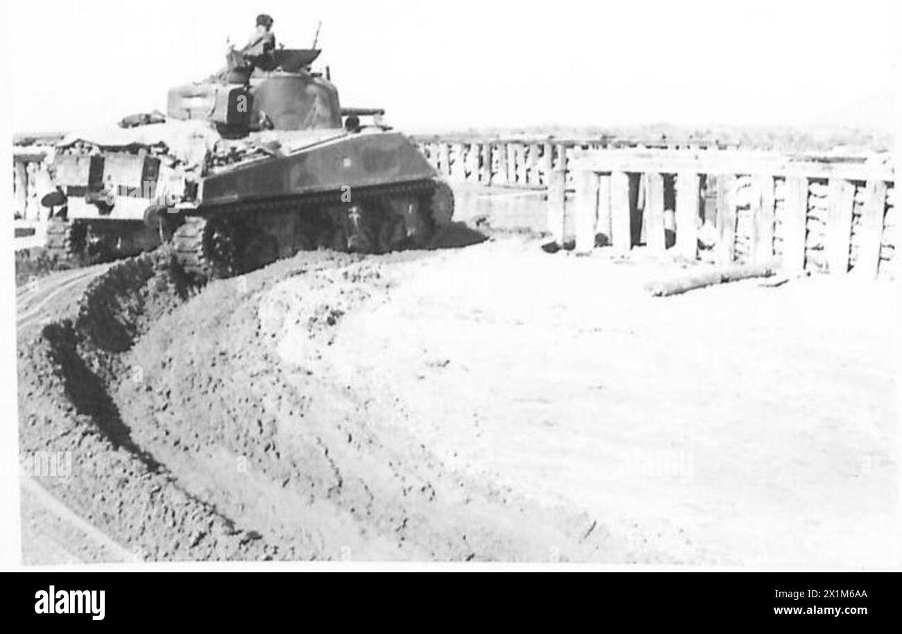 ITALY : FIFTH ARMY FRONT - Sherman tanks ploughing through the soft ...
