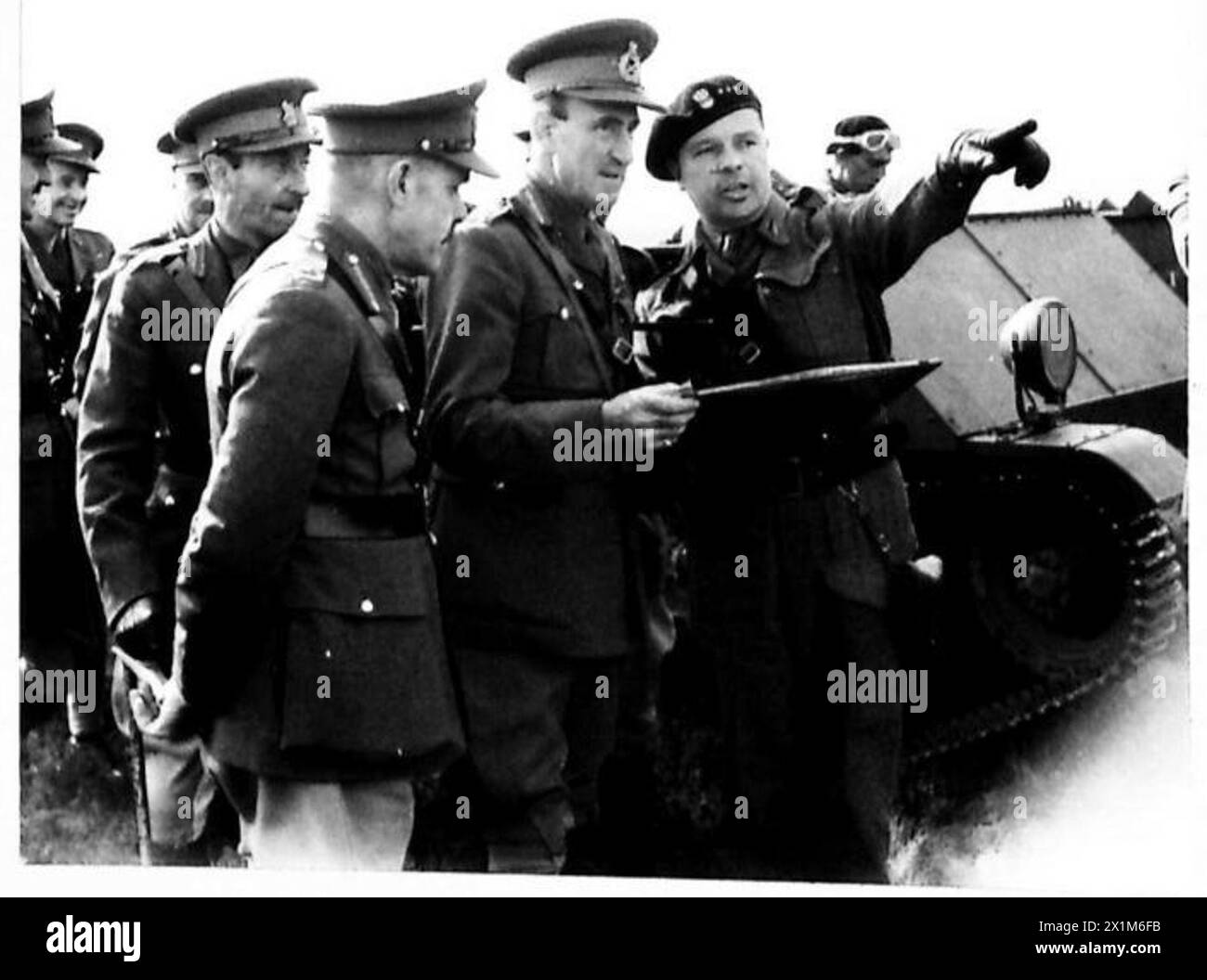 negative - A Polish tank officer describing a tank exercise to the C-in ...