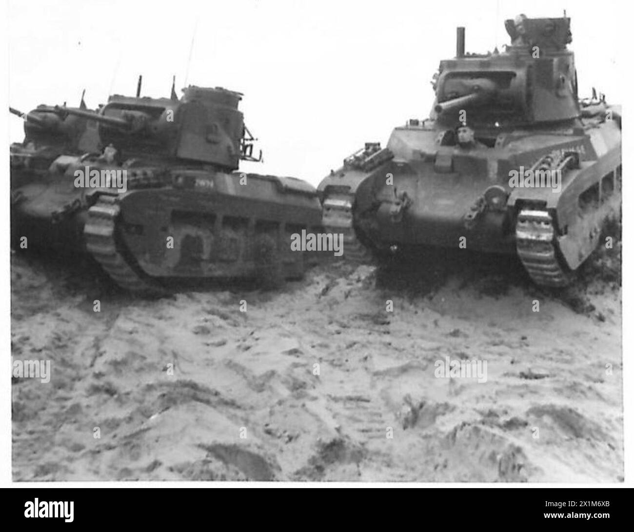 Matilda tanks advance over rough terrain during a demonstration at a ...