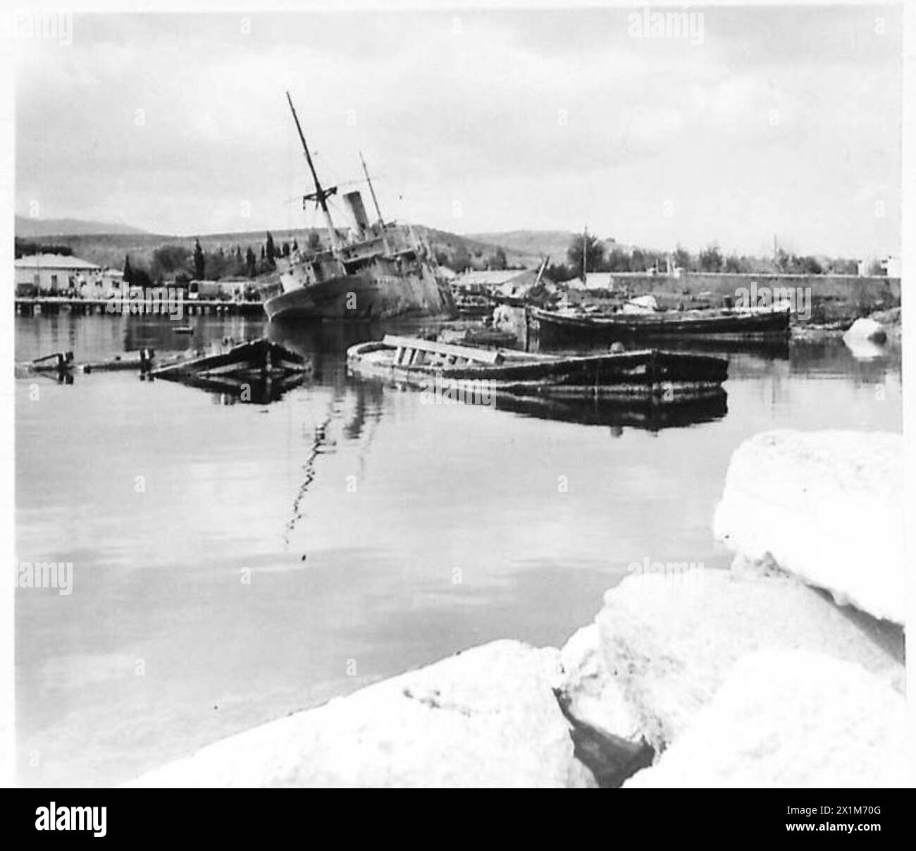 A large merchant ship blocks the western entrance of the Corinth Canal ...