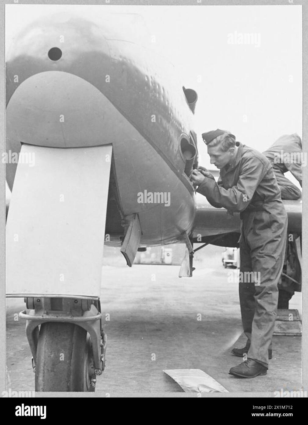 WORK AT AN R.A.F. STATION - Picture issued 1945 shows - An R.A.F ...