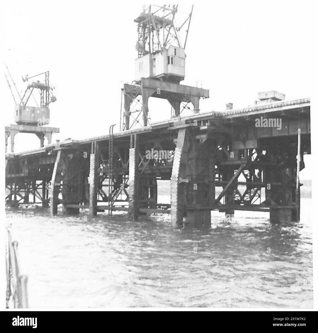 Photographs document German-built jetty and military equipment at ...