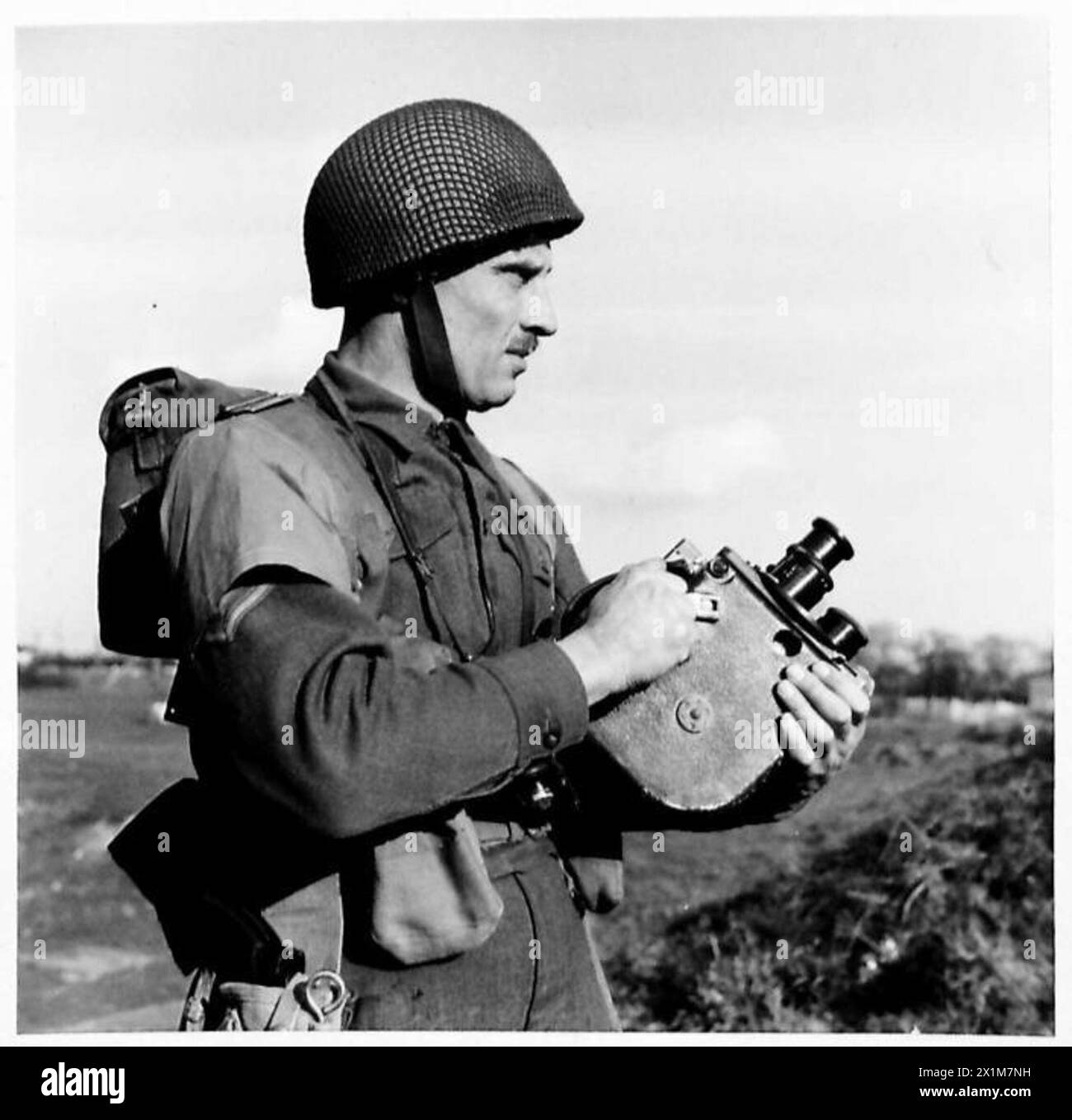 Sergeant Rottner of the Pioneer Corps serves as a cameraman with the ...