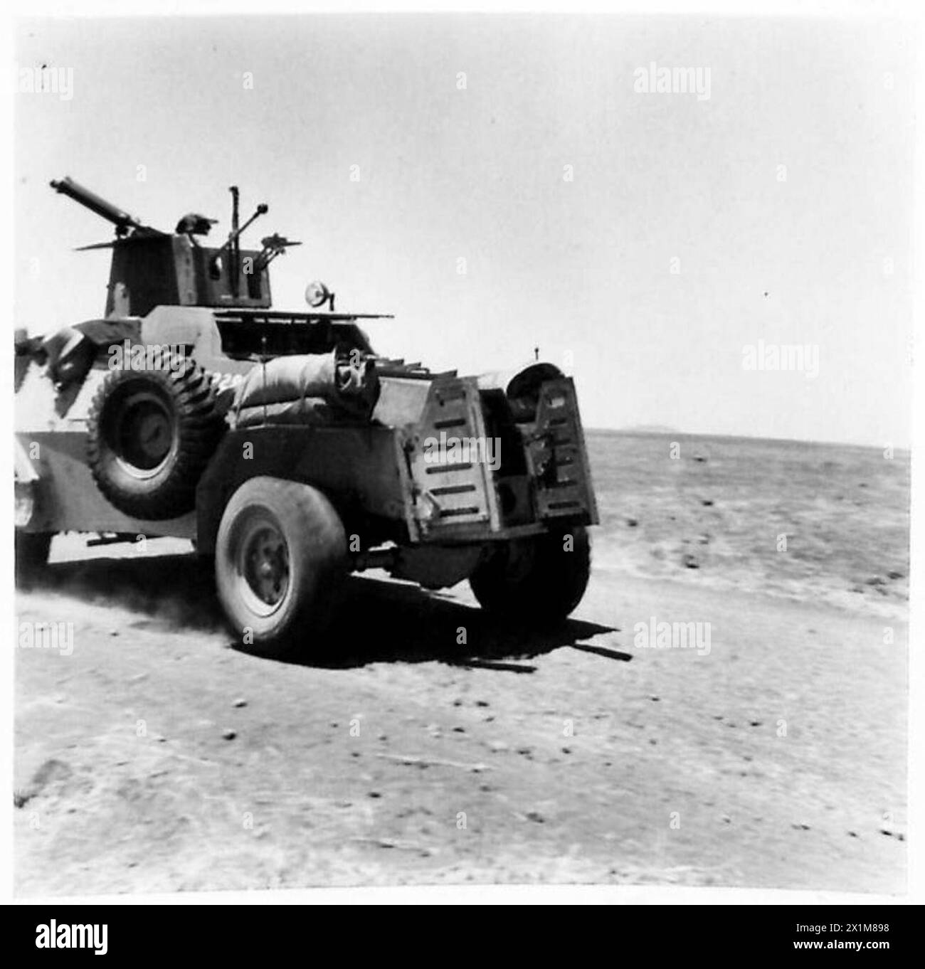 British Army armoured cars advance along the Damascus Road in Syria, illustrating operational ...