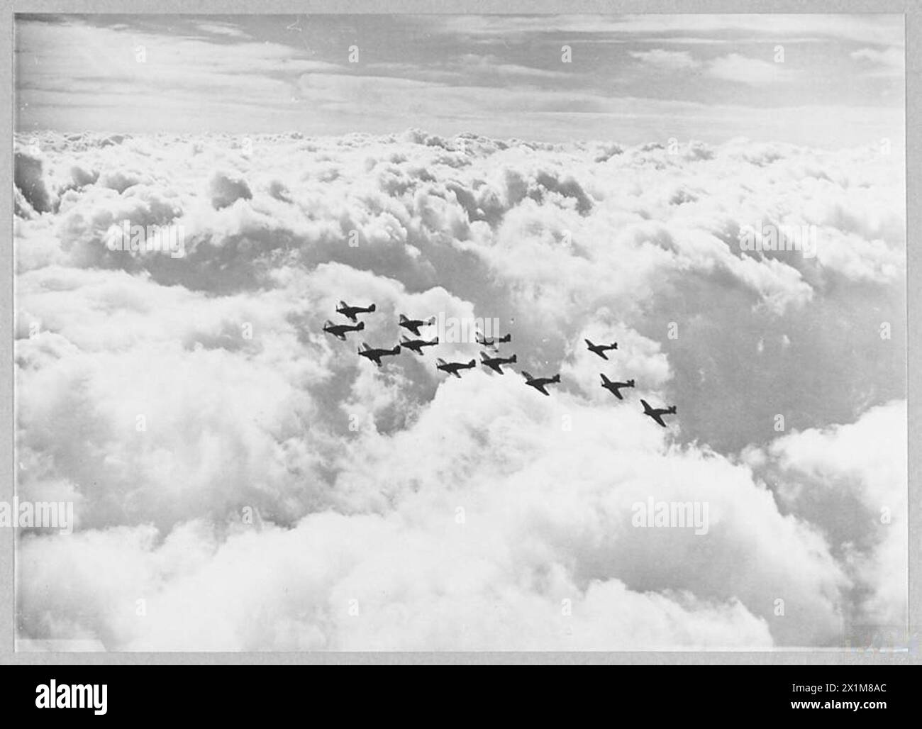 Hawker Hurricanes of No. 85 Squadron fly over Britain in October 1940 ...