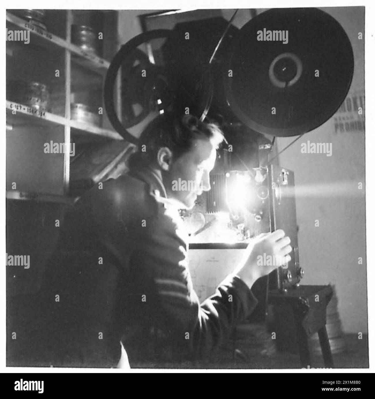 ATS PROJECTIONISTS - Corporal Duckett, ATS film projectionist is seen ...