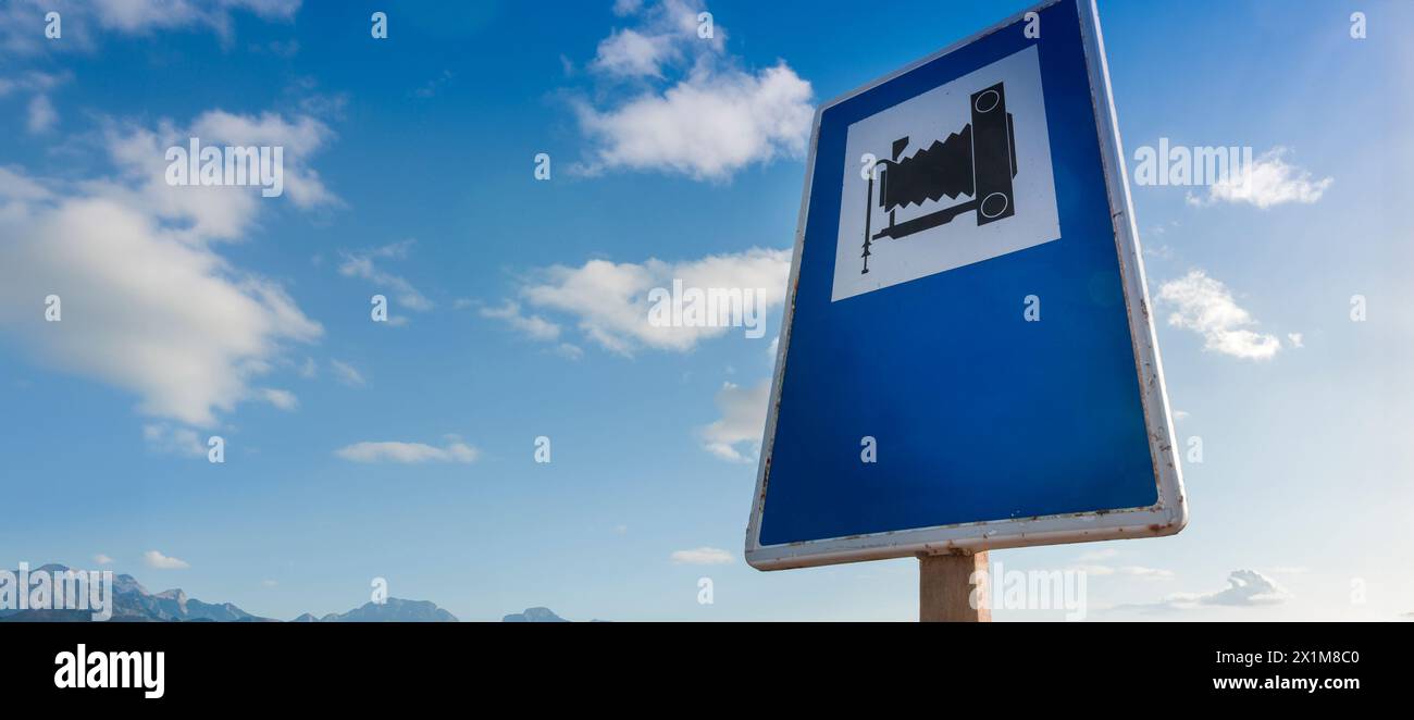 Blue camera viewpoint sign by the road Stock Photo - Alamy