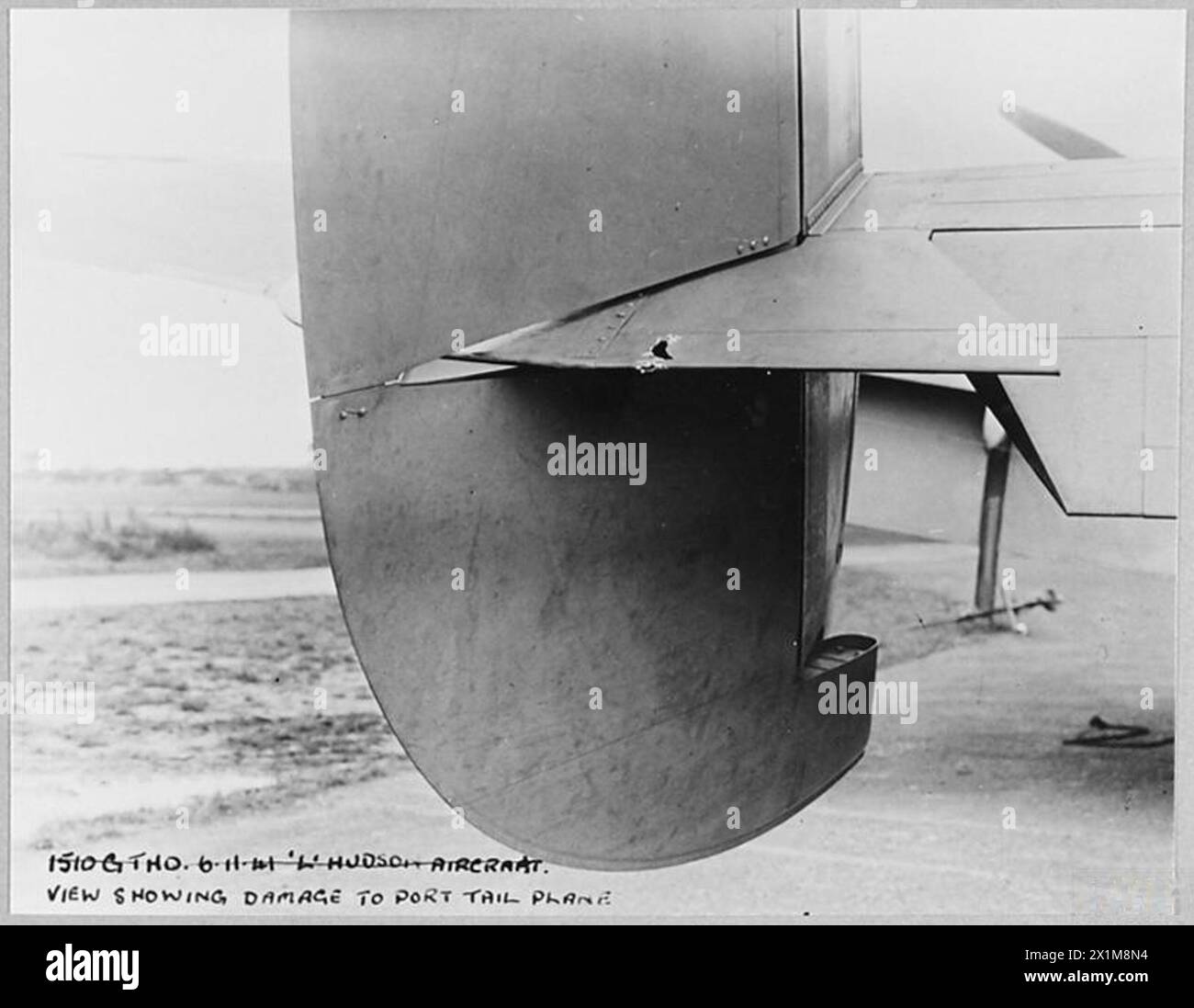 DAMAGE TO "HUDSON AIRCRAFT" BY "FLAK" - Photographs show damage to ...