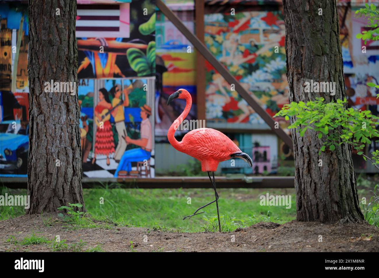 Decorative plastic pink flamingo Stock Photo - Alamy