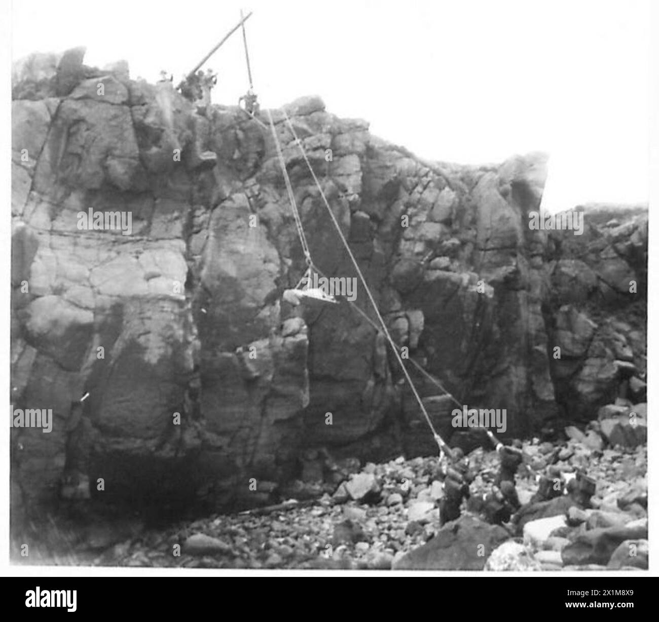 British Army personnel rescue a casualty from a cliff using a stretcher ...