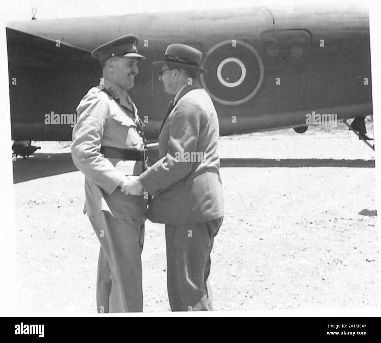 Major General Gale greets Sir Edward Grigg during H.M. the King’s visit ...