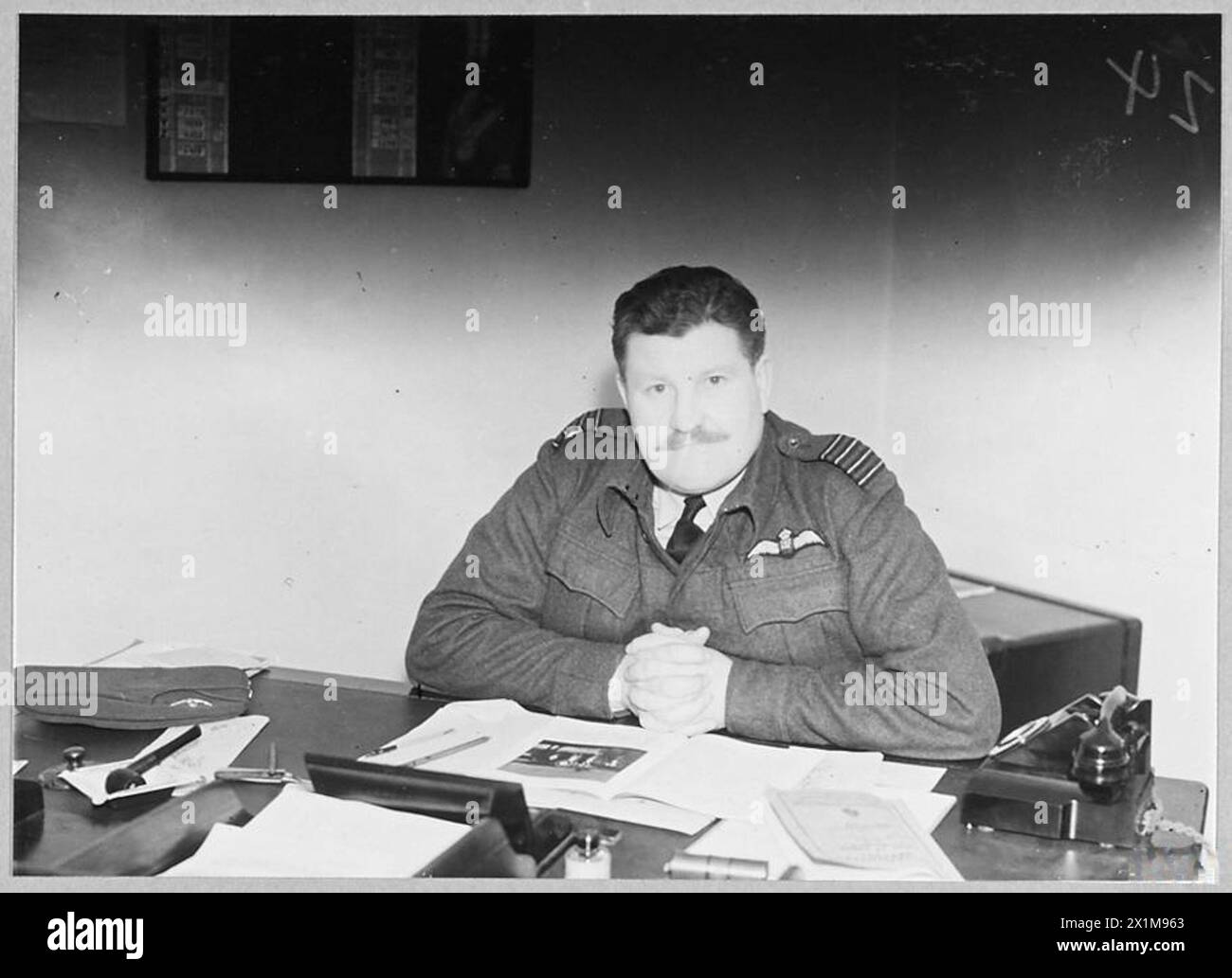 AT AN R.A.F. BOMBER STATION - Group Captain Evan Evans, Station ...