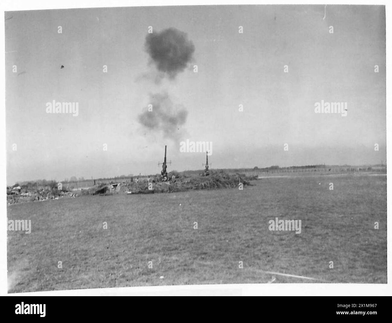 HEAVY ANTI-AIRCRAFT BATTERY IN ACTION - The battery in action during an ...
