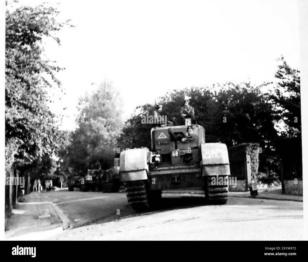 Major D.J.H. Ballantine, acting Commanding Officer, leads his tanks ...