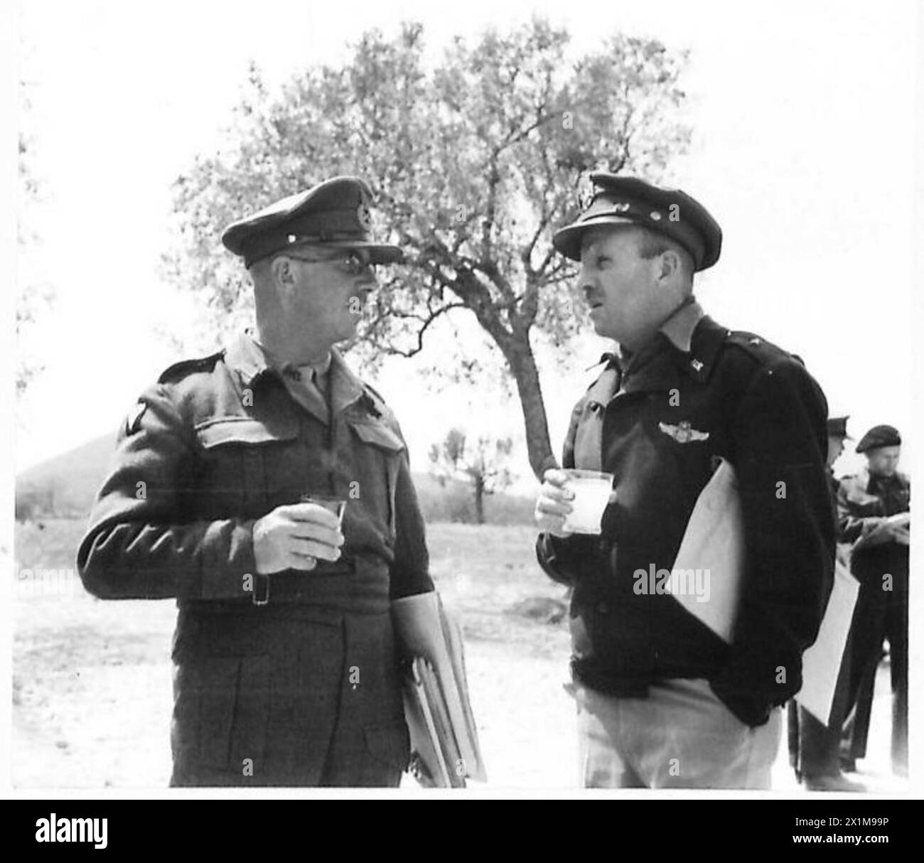 Major General G.P. Walsh and General Saville attend an Eighth Army ...