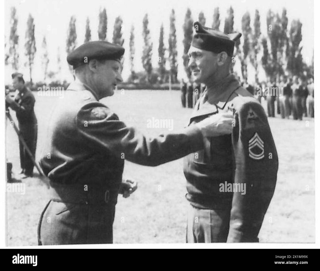 T/Sergeant James H. Meeks of the 62nd Armoured Infantry Battalion is ...