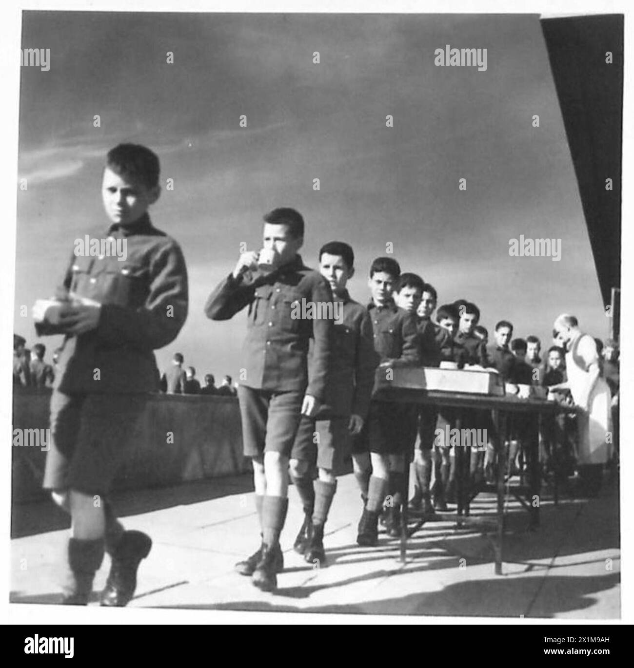 Boys at the Duke of York's Royal Military School receive half a pint of ...