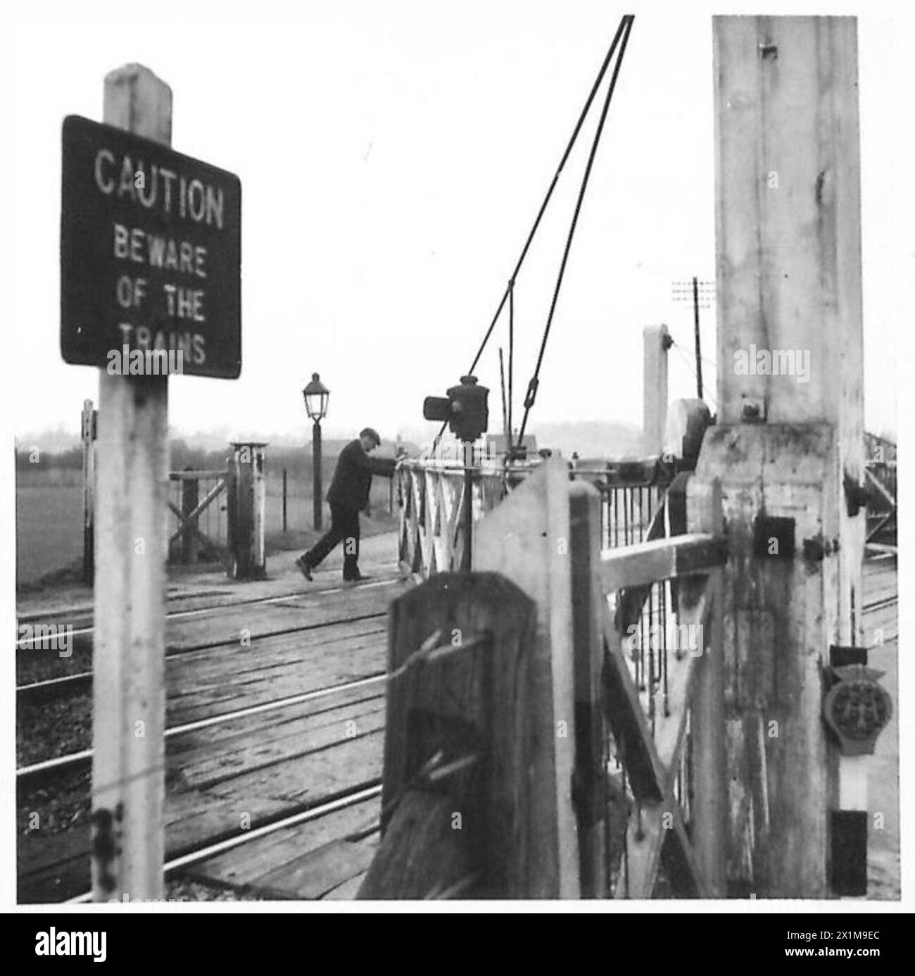 Level crossing with gates Black and White Stock Photos & Images - Alamy