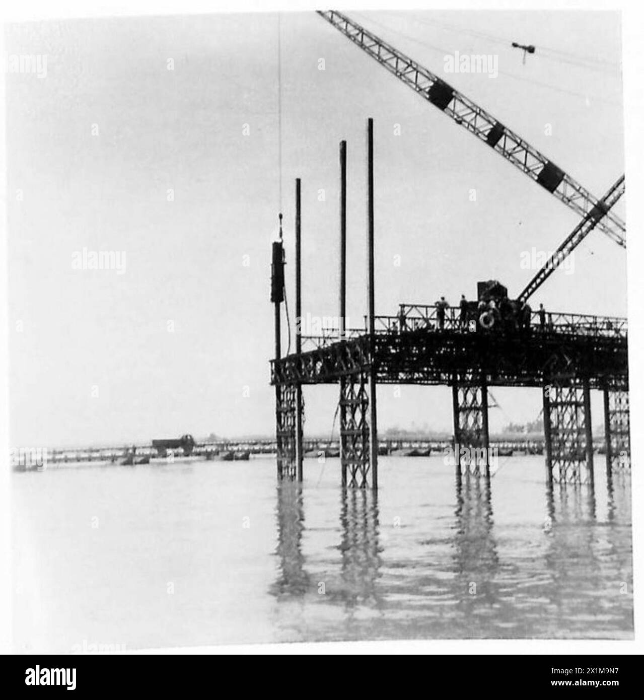 PERMANENT RHINE BRIDGES - Piles being driven in, British Army, 21st ...