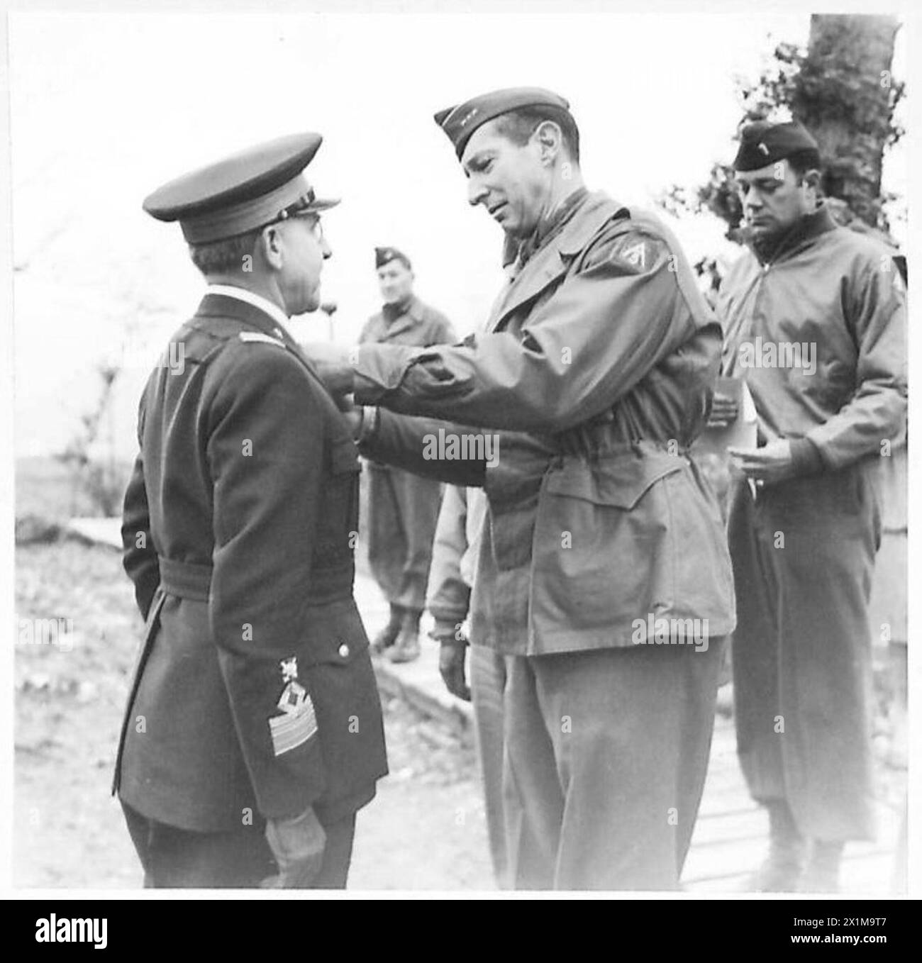 General Mark Clark of the Fifth Army presents the Bronze Star to ...