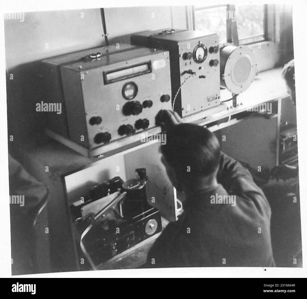 FIFTH ARMY - Sgmn J. Pitts at work on the highspeed receiving receiver ...