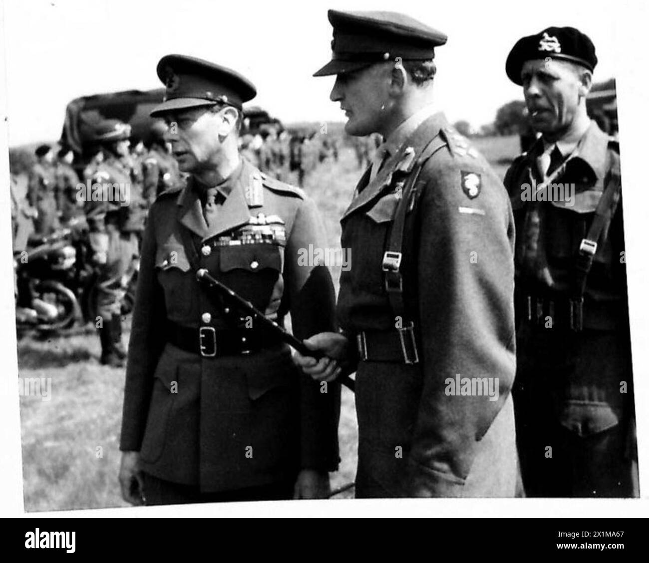 THE KING'S VISIT TO INVASION TROOPS - The King talking to Brigadier G.E ...