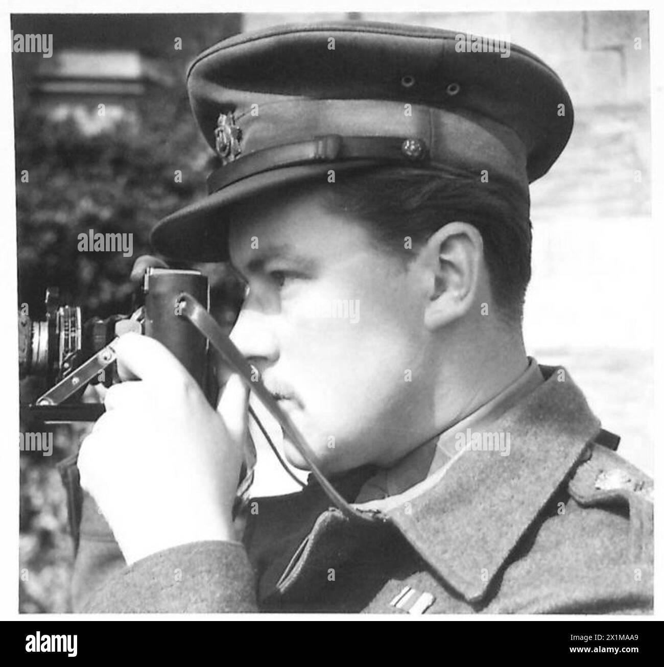 Capt. Alan Whicker, Officer in charge of cameramen in No.2 Army Film ...