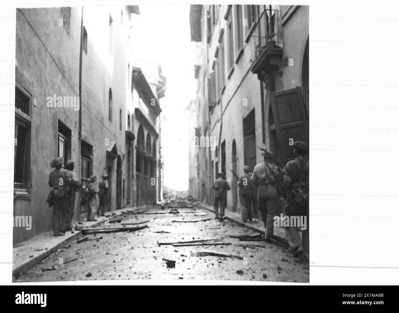 A patrol from 4 Platoon, A Company, South African Division, clears ...