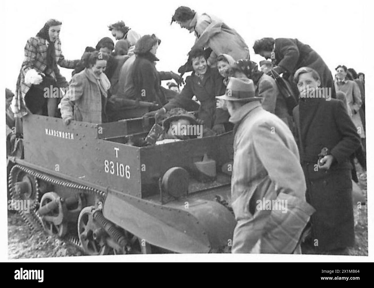 MUNITION WORKERS WATCH ARMY DEMONSTRATE 3-INCH MORTAR - When the ...