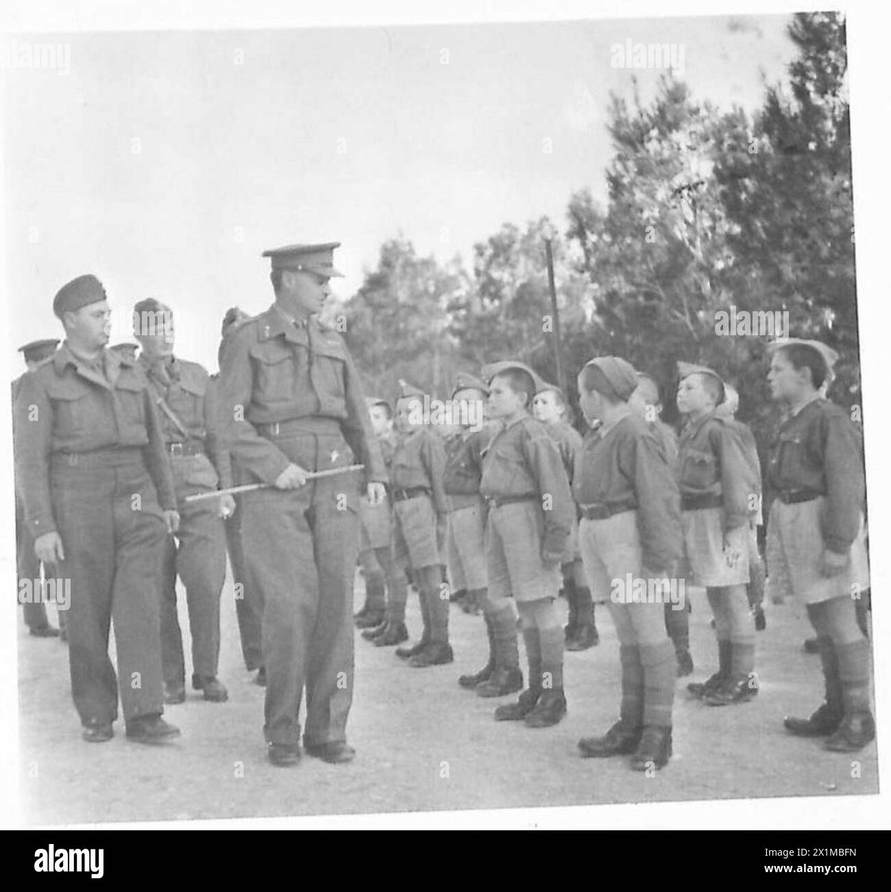 General Douglas Fitzgerald McConnel inspects Polish refugee boys at the ...