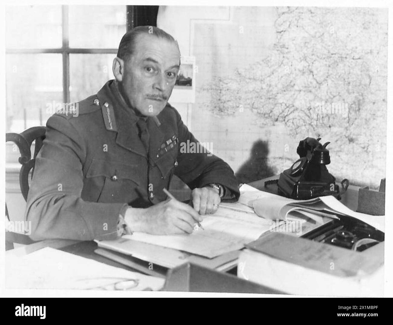 AIRFIELD DEFENCE CHIEF BEGINS WORK - Major-General Liardet at his HQ ...