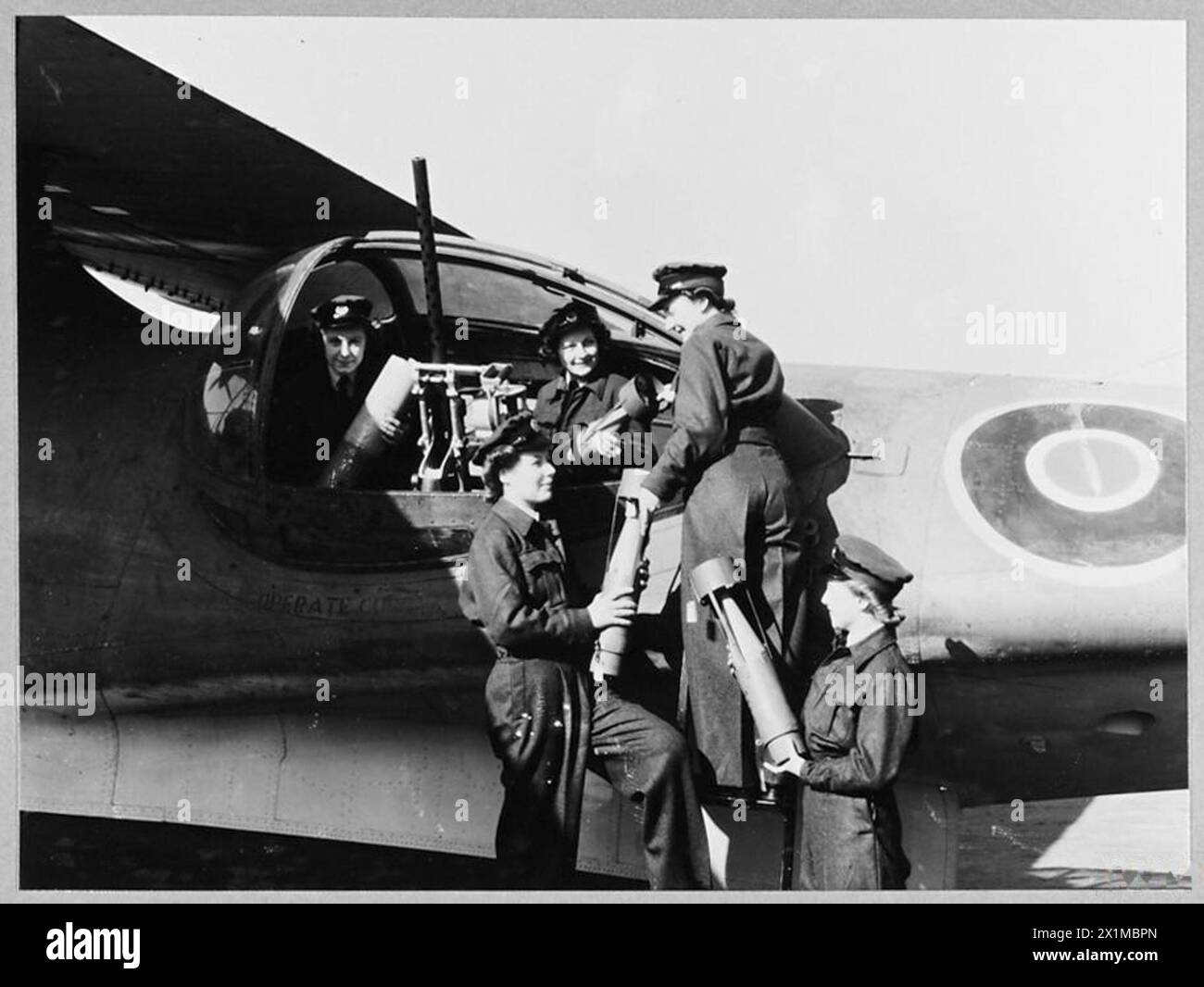 W.A.A.F. GROUND CREWS FIGHT THE U-BOAT MENACE. - 8973 (Picture issued ...