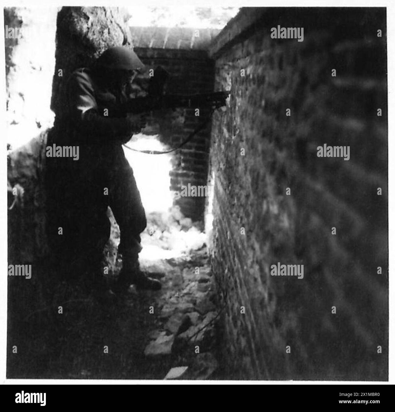 Private E. Maclaren of No. 4 Commando poses in a ruined building in ...