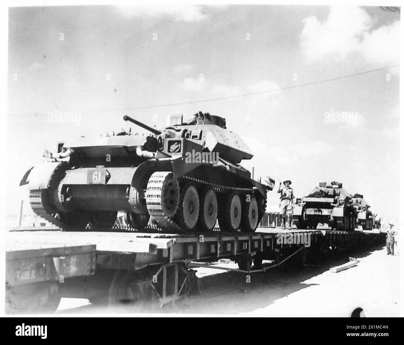 NEW EQUIPMENT ARRIVES IN EGYPT - Tanks being loaded on to trucks at the ...