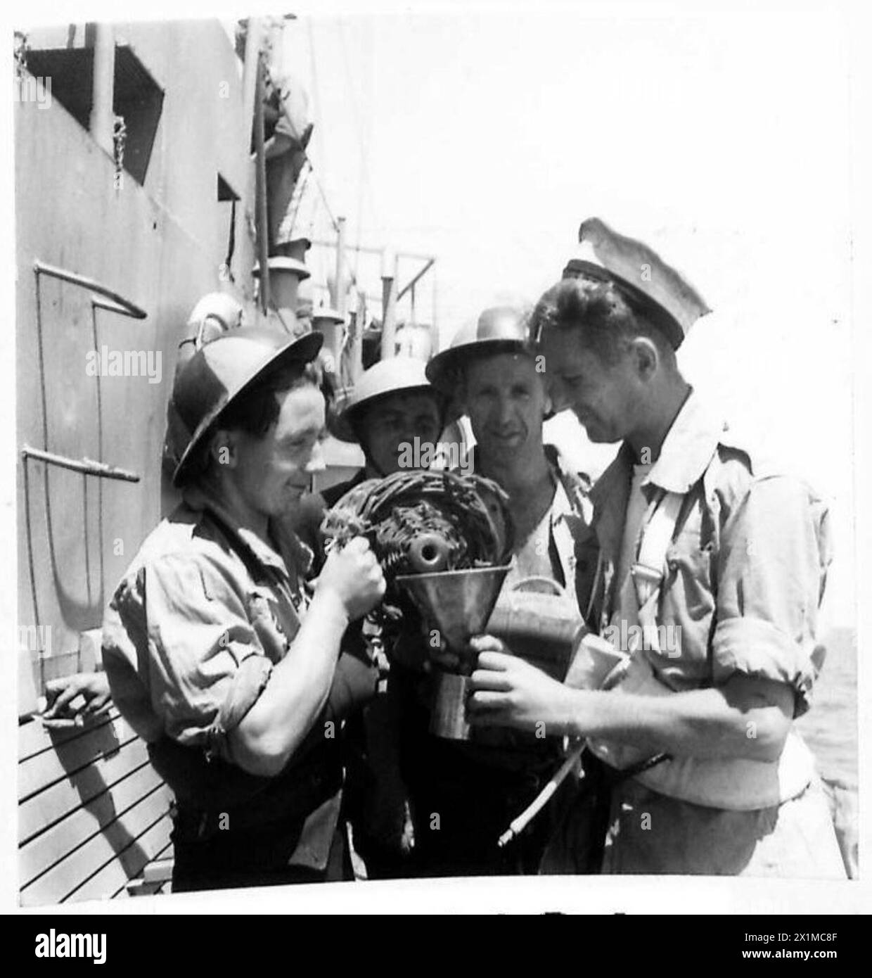 INVASION OF SICILY : FIRST PICTURES - Men line up for rum issue on one ...