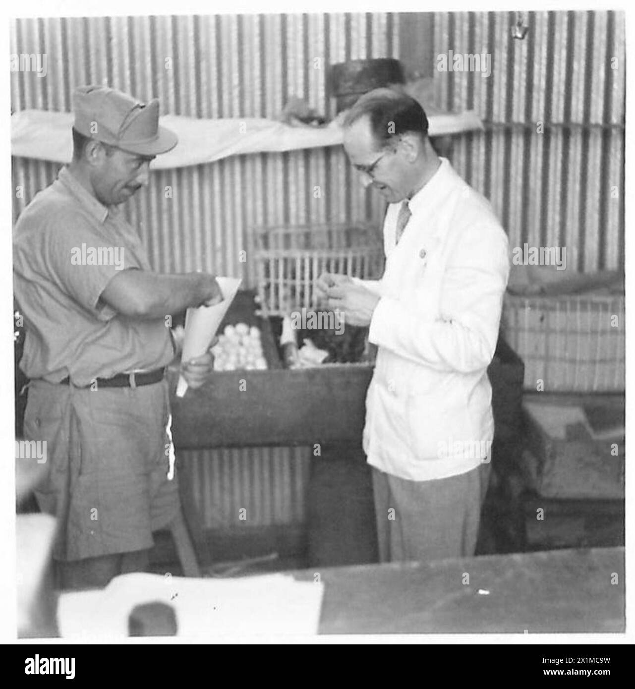 International Red Cross representative Mr. de Haller visits a POW camp ...