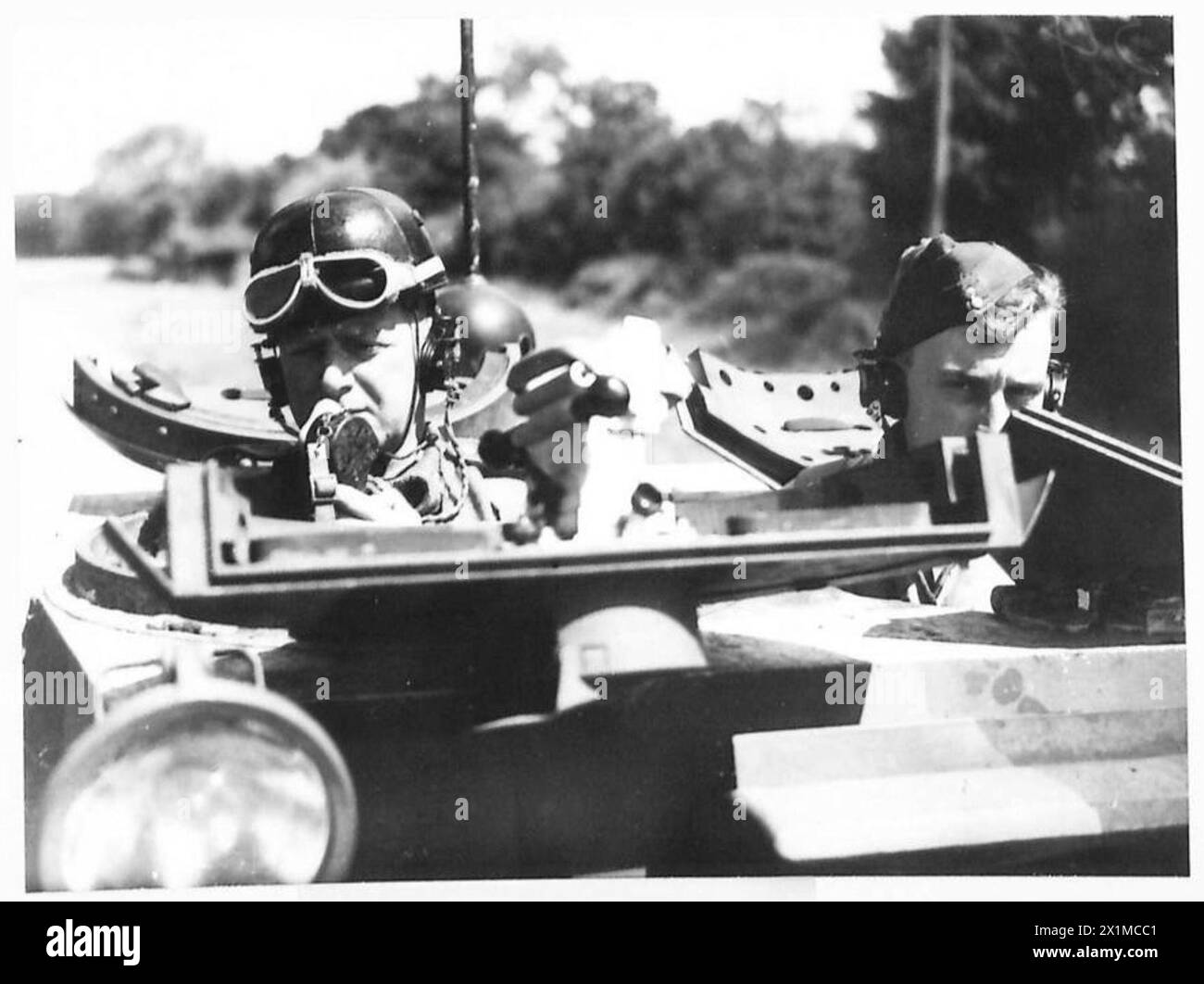 Troop Commander observes fast scout tanks performing exercises ...