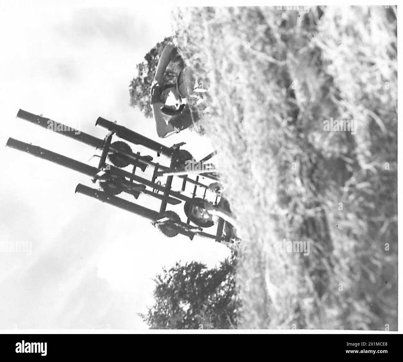 Four Lewis machine guns are mounted together on a single platform ...