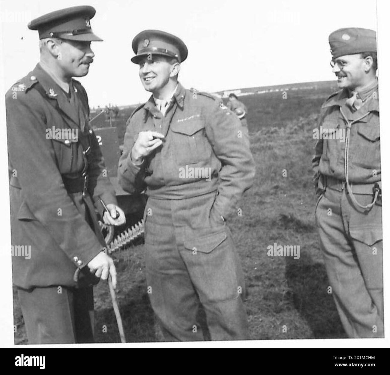 A MOORLAND EXERCISE IN NORTHERN COMMAND - Major Pilkington, M.C. (left ...