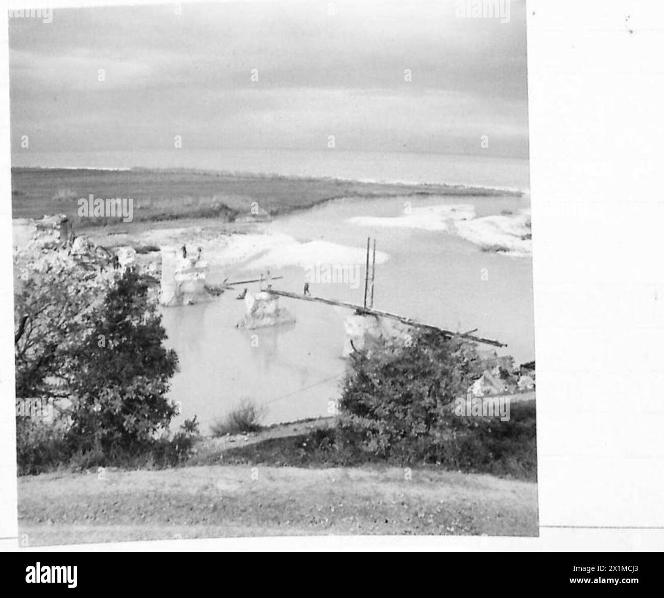 View of the demolished bridge over the Sangro River, observed from the ...