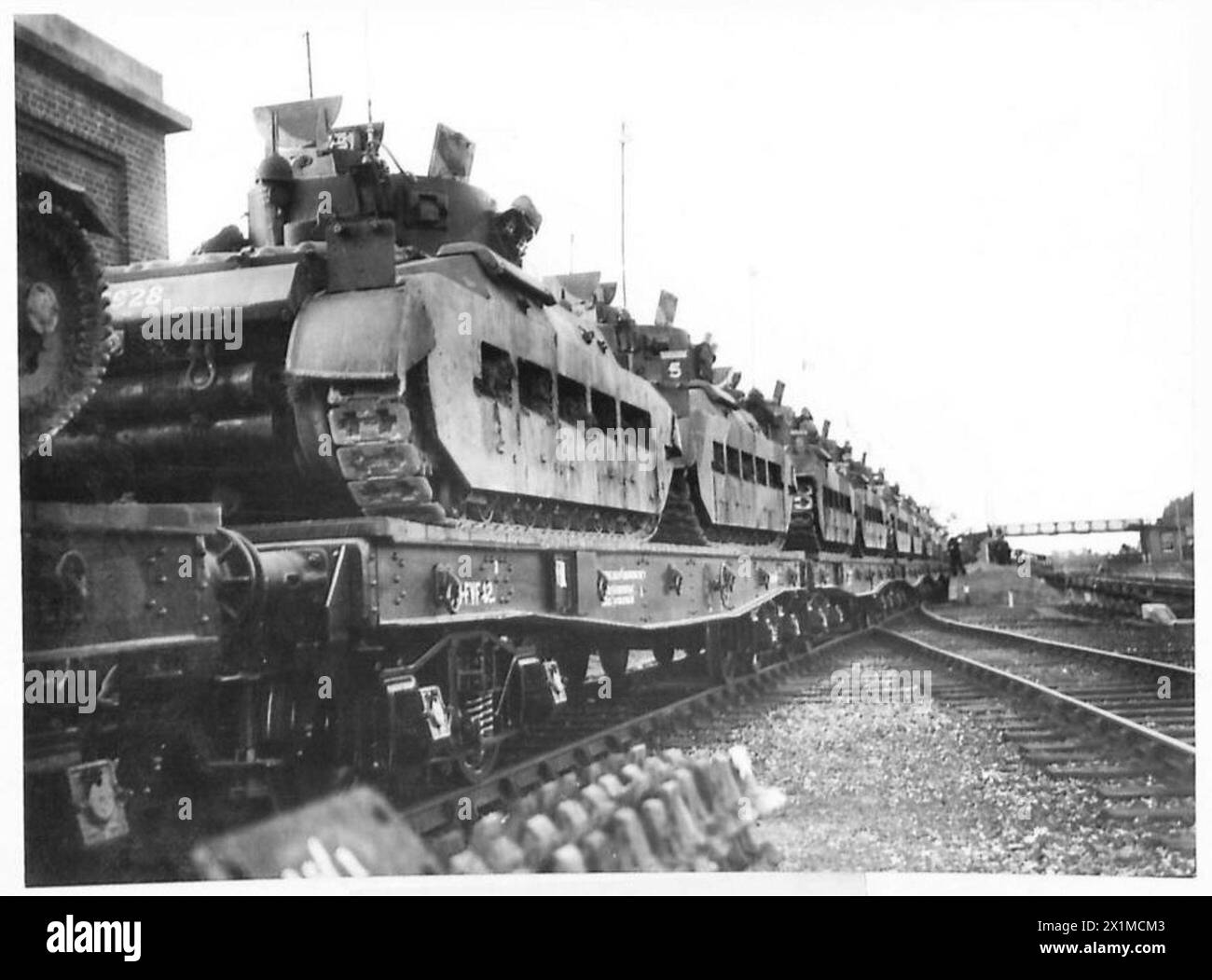LOADING TANKS ON A SPECIAL RAIL TANK CONVEYOR - Tanks aboard the train ...