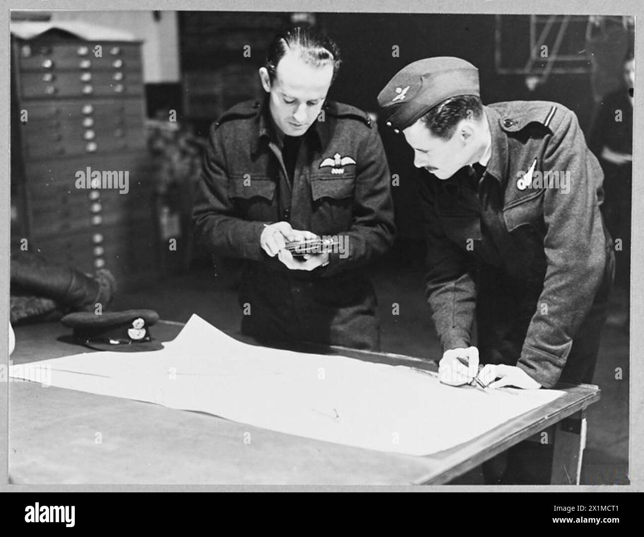 AN R.A.F. "LIBERATOR" CREW IS BRIEFED AND PREPARESFOR ACTION - 8050 The ...